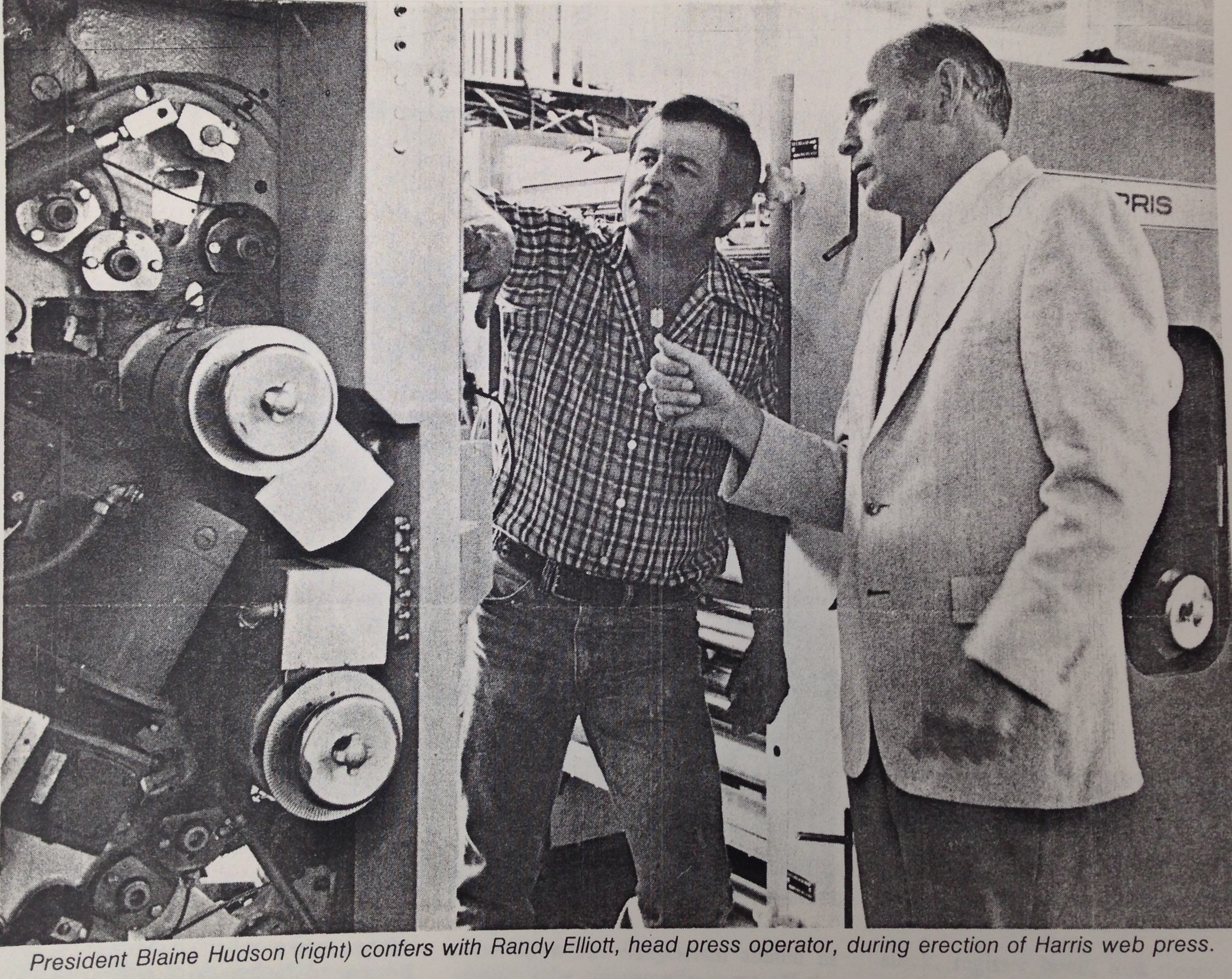 President Blaine Hudson confers with Randy Elliott during Harris web ...